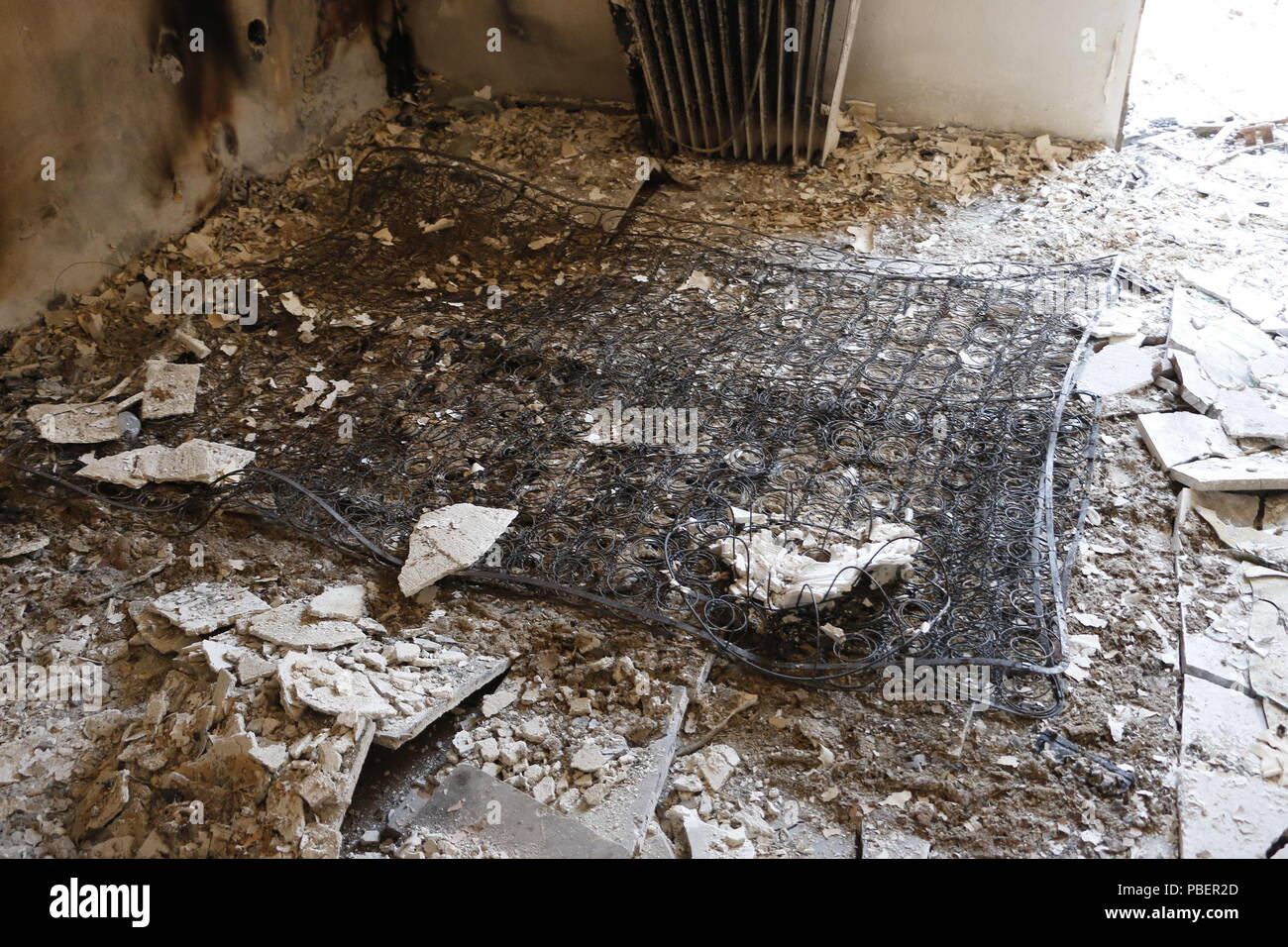 Athens, Greece. 28th July, 2018. Ashes are seen laying on the ground.A ...