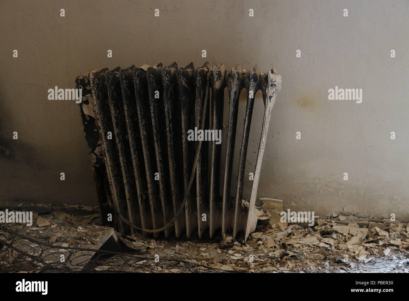 Athens, Greece. 28th July, 2018. A burnt air conditioner seen laying on ...