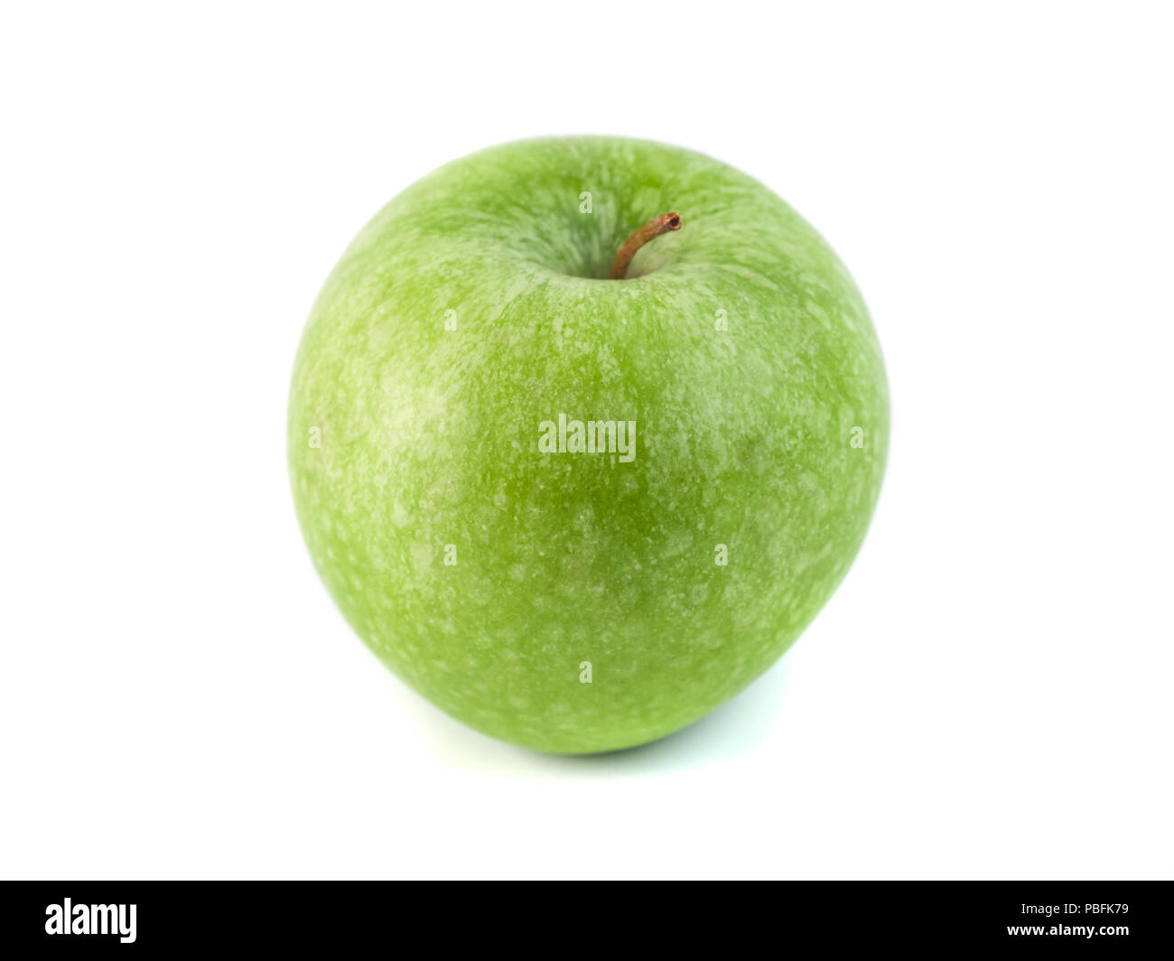 one green apple isolated on a white background Stock Photo - Alamy