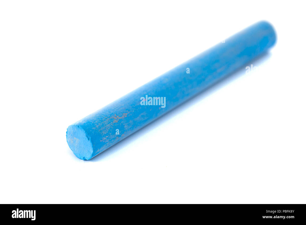 stick of blue chalk on white background Stock Photo - Alamy