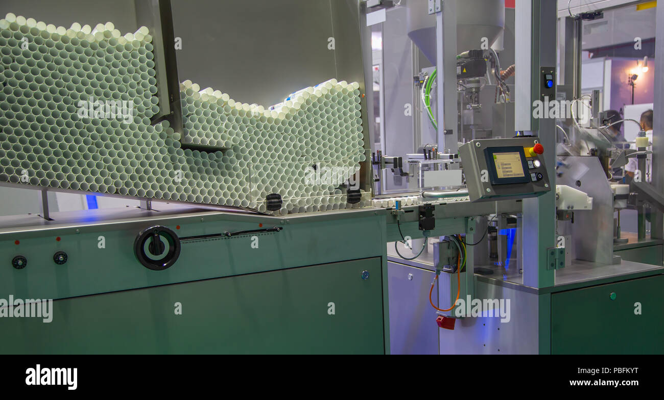 Production line for plastic tubes filling and sealing machine Stock ...