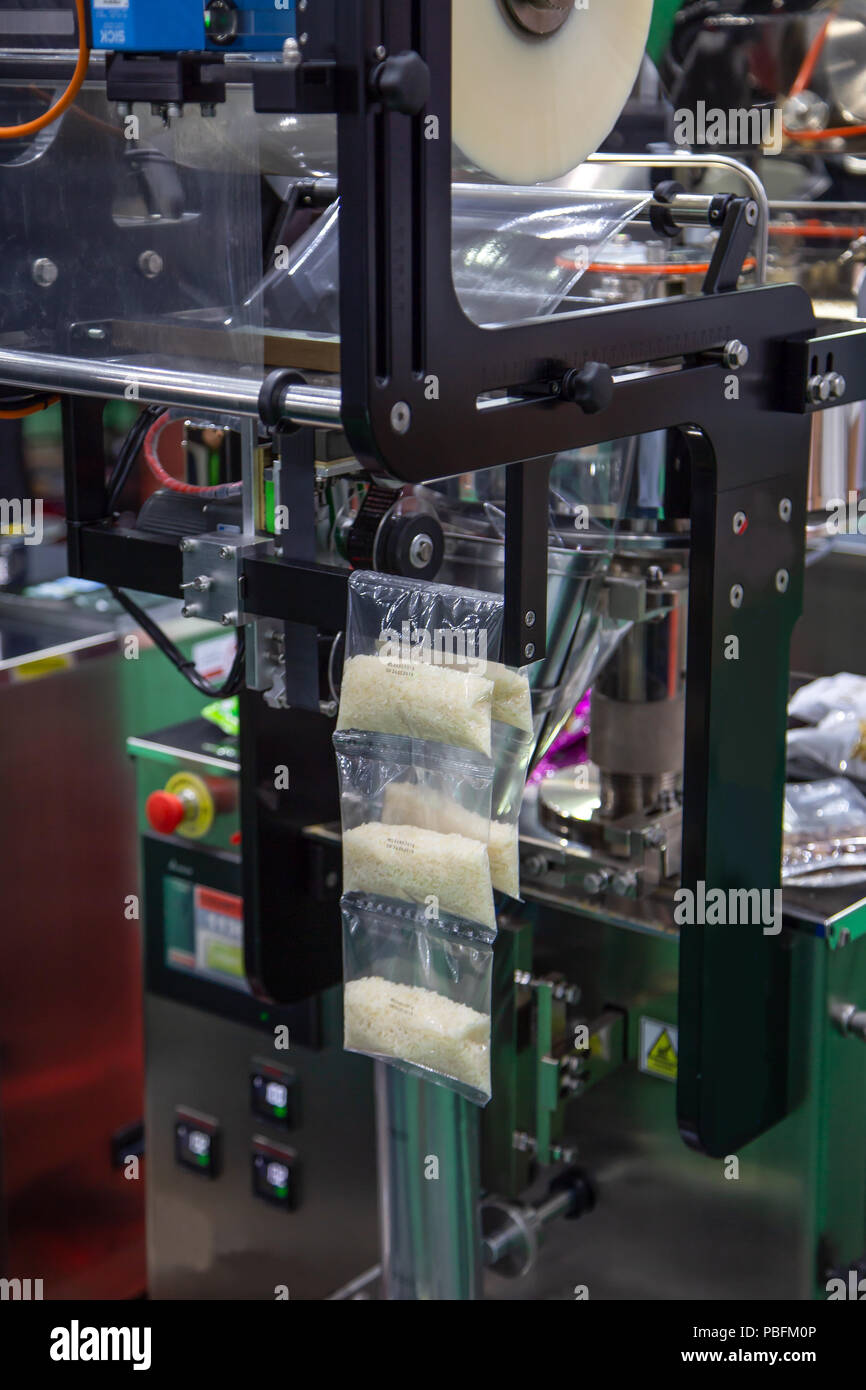 Rice packing on Automatic vertical sealing and packing machine Stock ...