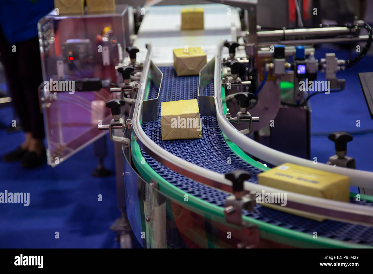 Automatic Carton Filling and Packaging Line Stock Photo - Alamy