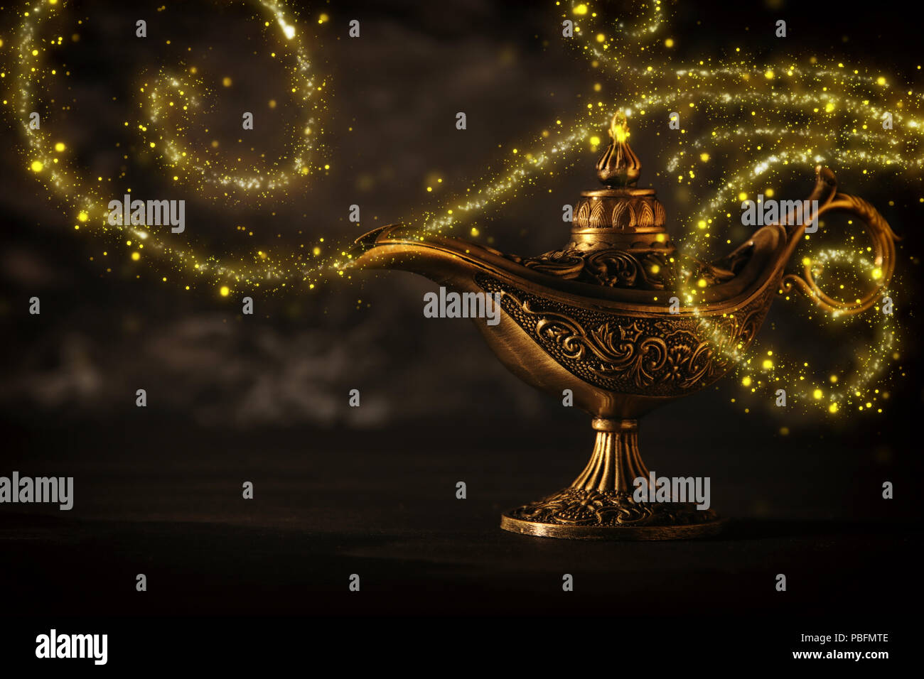 Image of magical mysterious aladdin lamp with glitter sparkle smoke ...