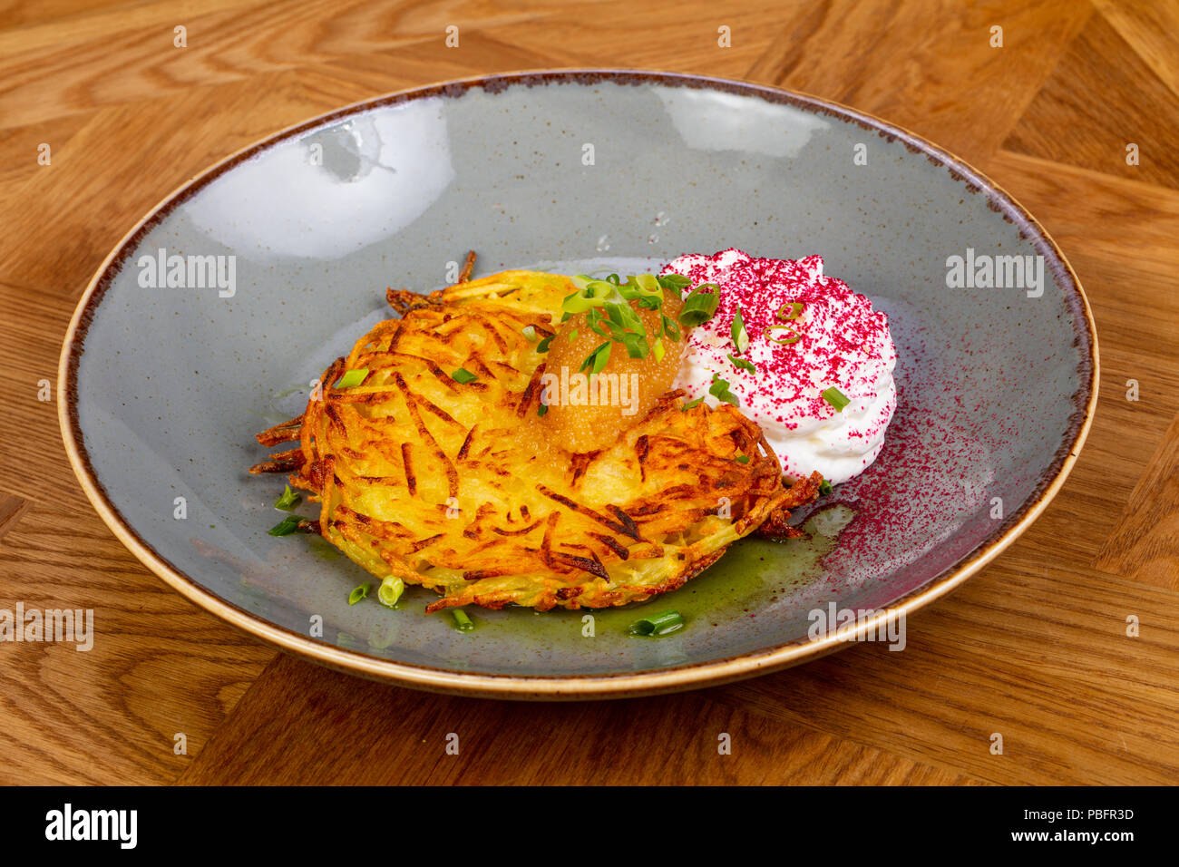 Potato pancake - dranik with pike caviar Stock Photo - Alamy