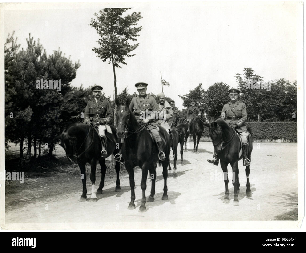 1540 Sir John French riding with A.D.C.s and Indian Cavalry escort ...