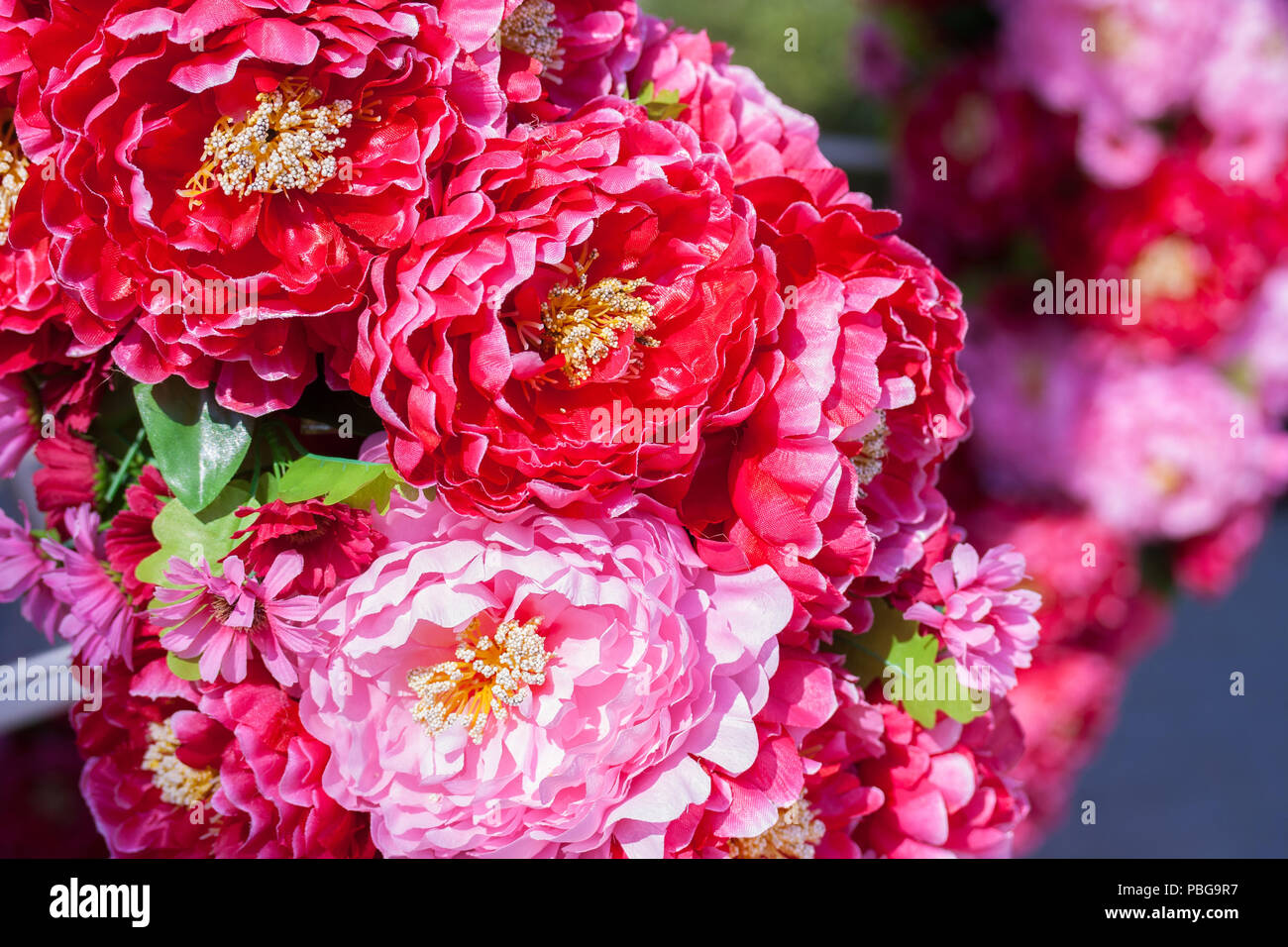 Beautiful colors of plastic flowers Stock Photo - Alamy