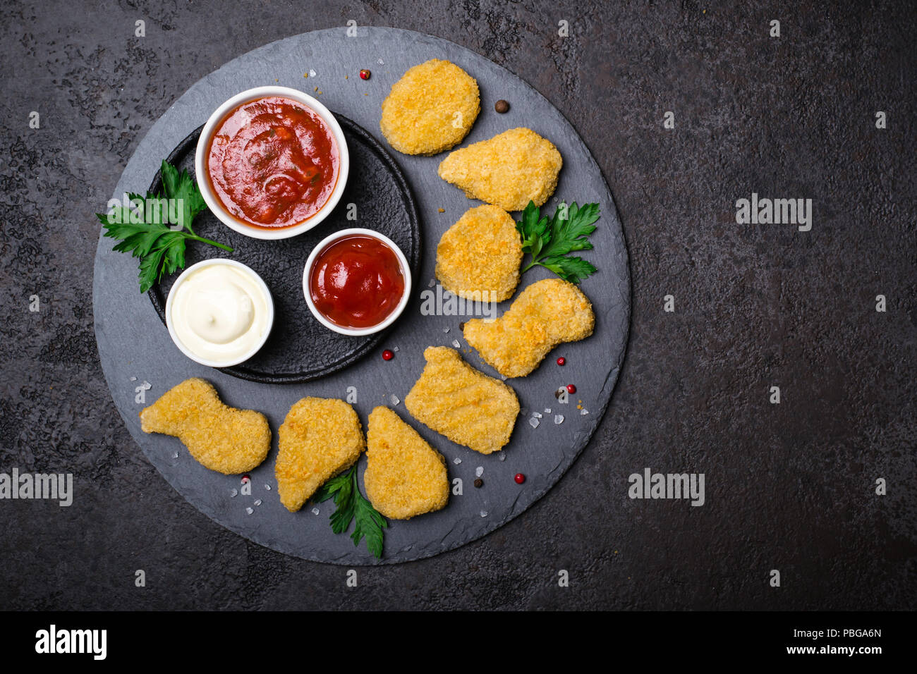 Chicken nuggets on round hi-res stock photography and images - Alamy