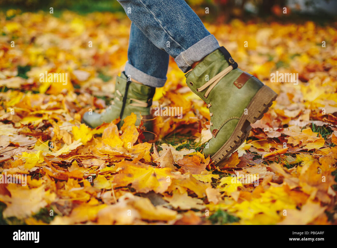 Fall leaves and hiking shoes hi-res stock photography and images - Alamy