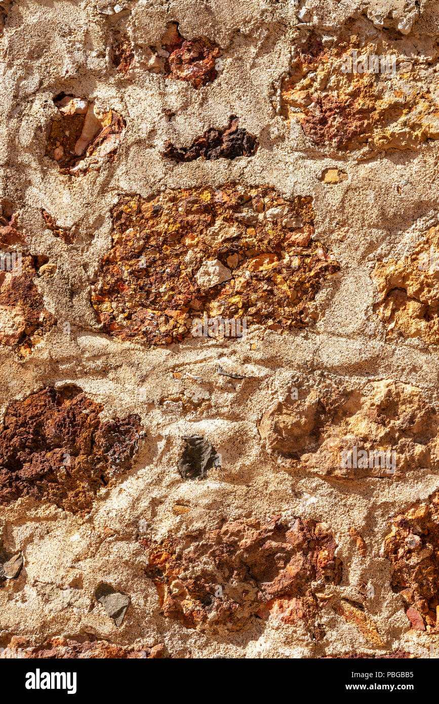 Cemented rough natural stone wall background Stock Photo - Alamy
