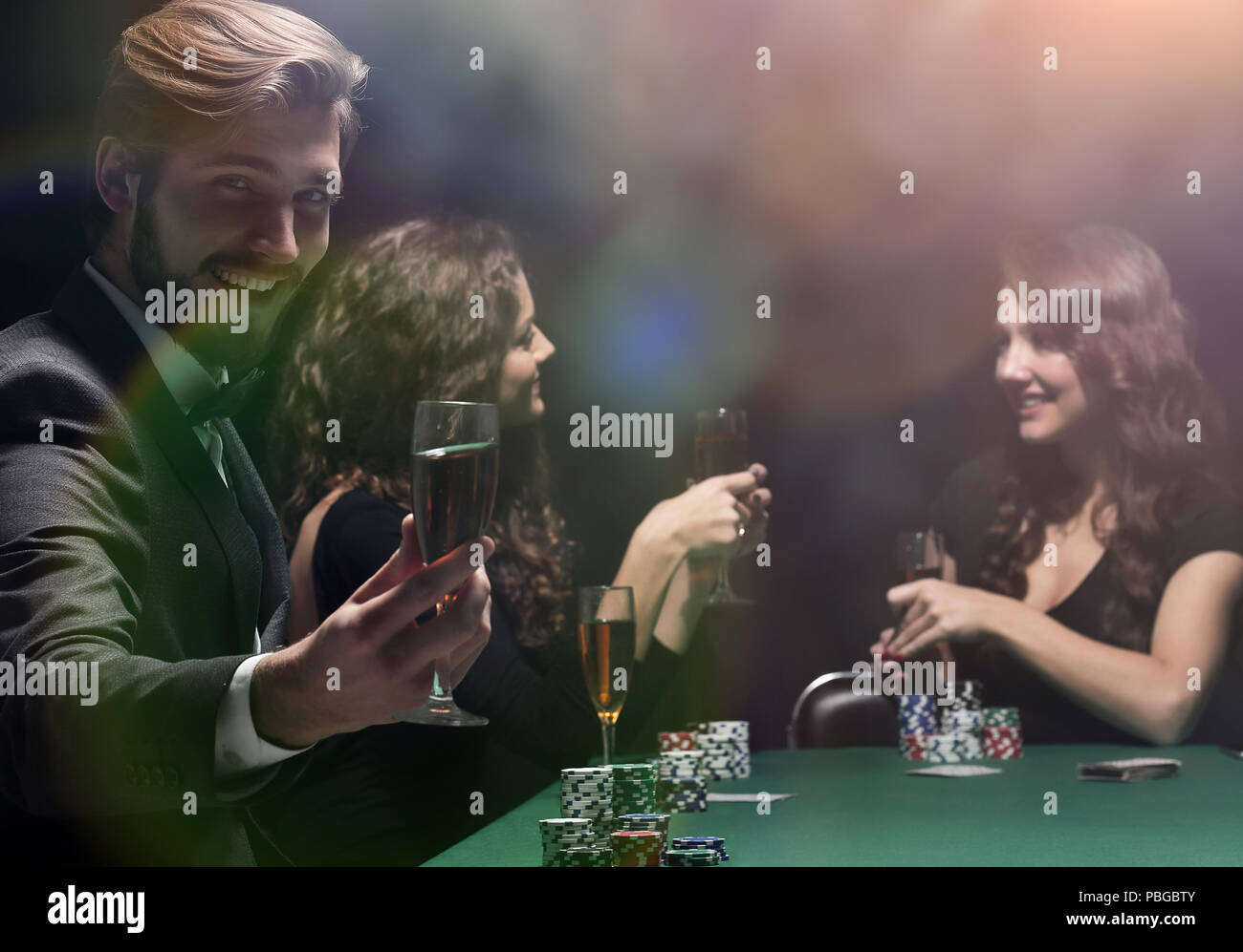 Happy and rich people celebrating their win after successful game Stock ...