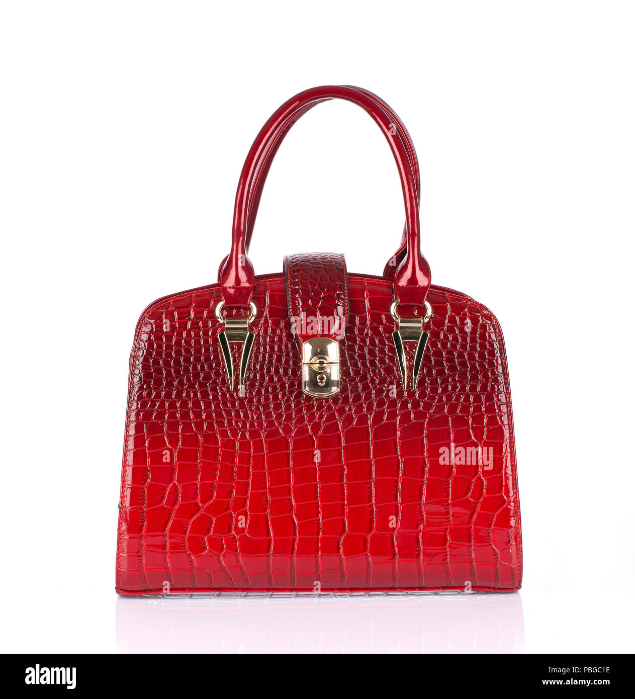 Elegant women red bag isolated on white background Stock Photo - Alamy