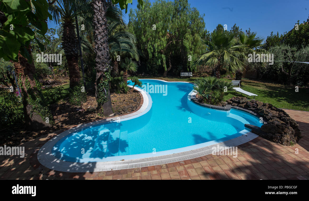 Simming pool in my garden, in summer, Naples, italy Stock Photo - Alamy