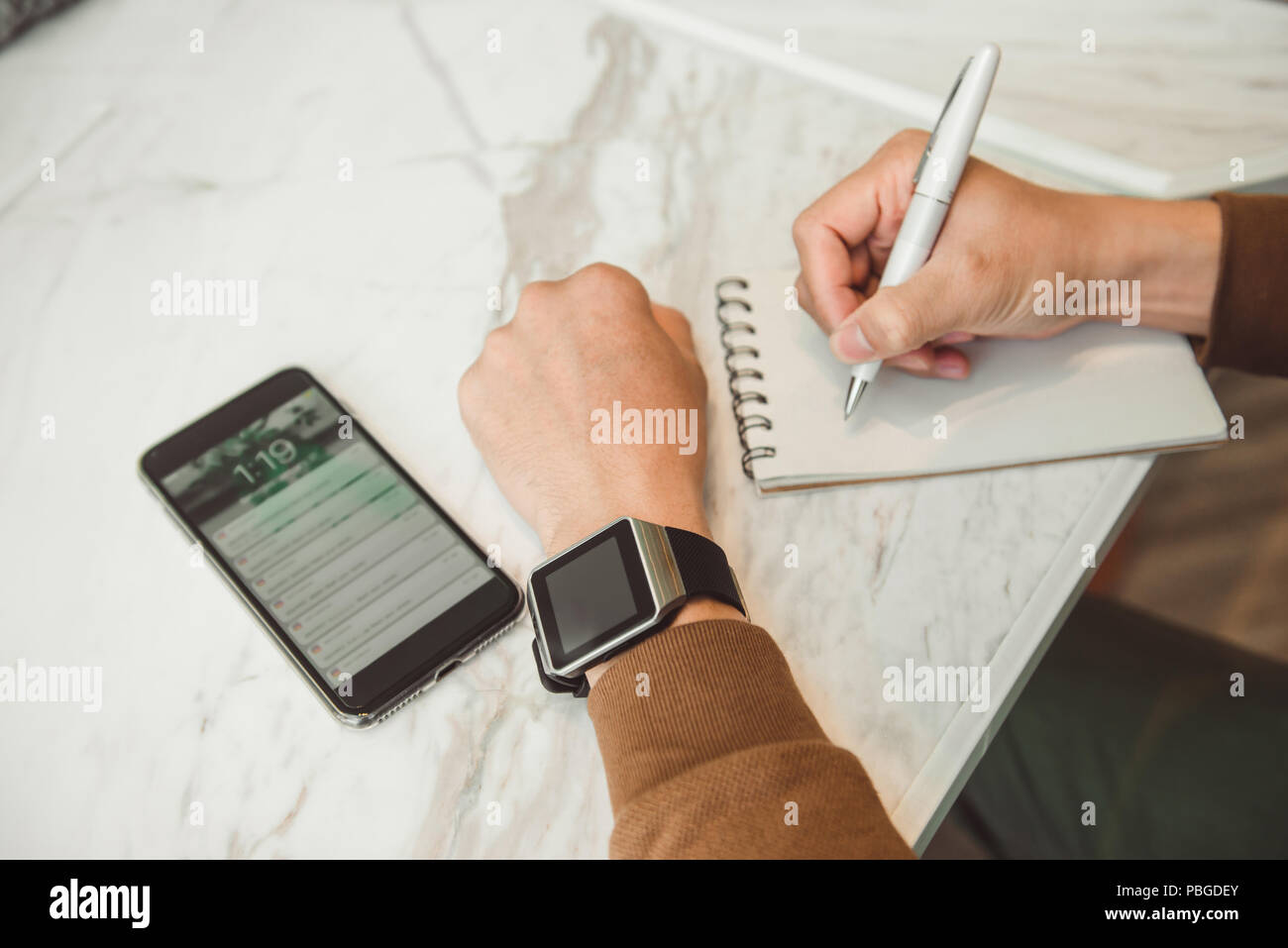 Man watch on the desk hi-res stock photography and images - Alamy