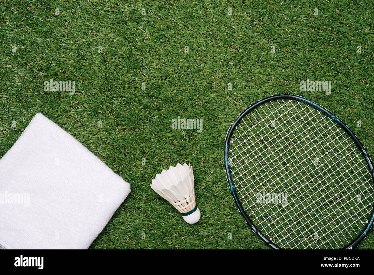 Badminton racket on the green , top view Stock Photo - Alamy