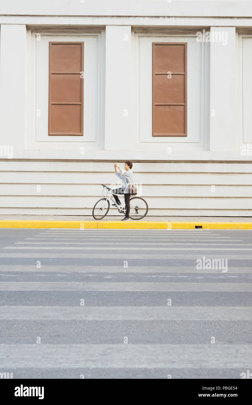Cyclist side view white background hi-res stock photography and images ...