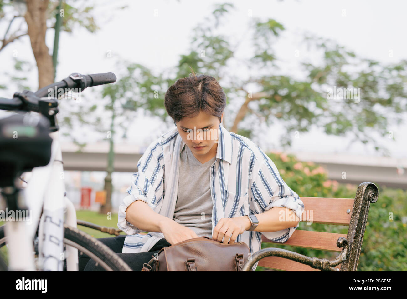 Man searching bag hi-res stock photography and images - Alamy