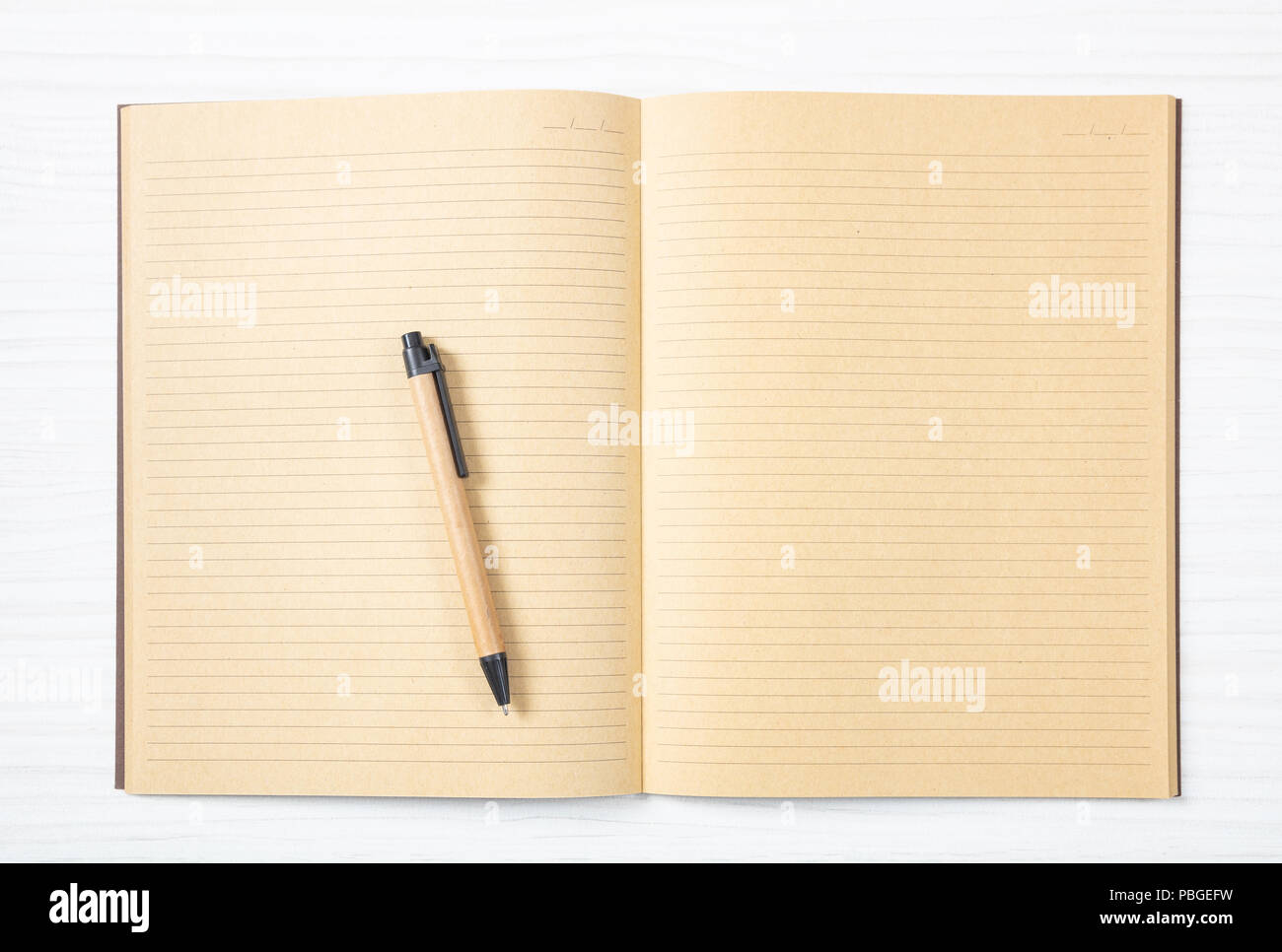 Open blank school notebook or diary and pen, old fashioned, on white ...