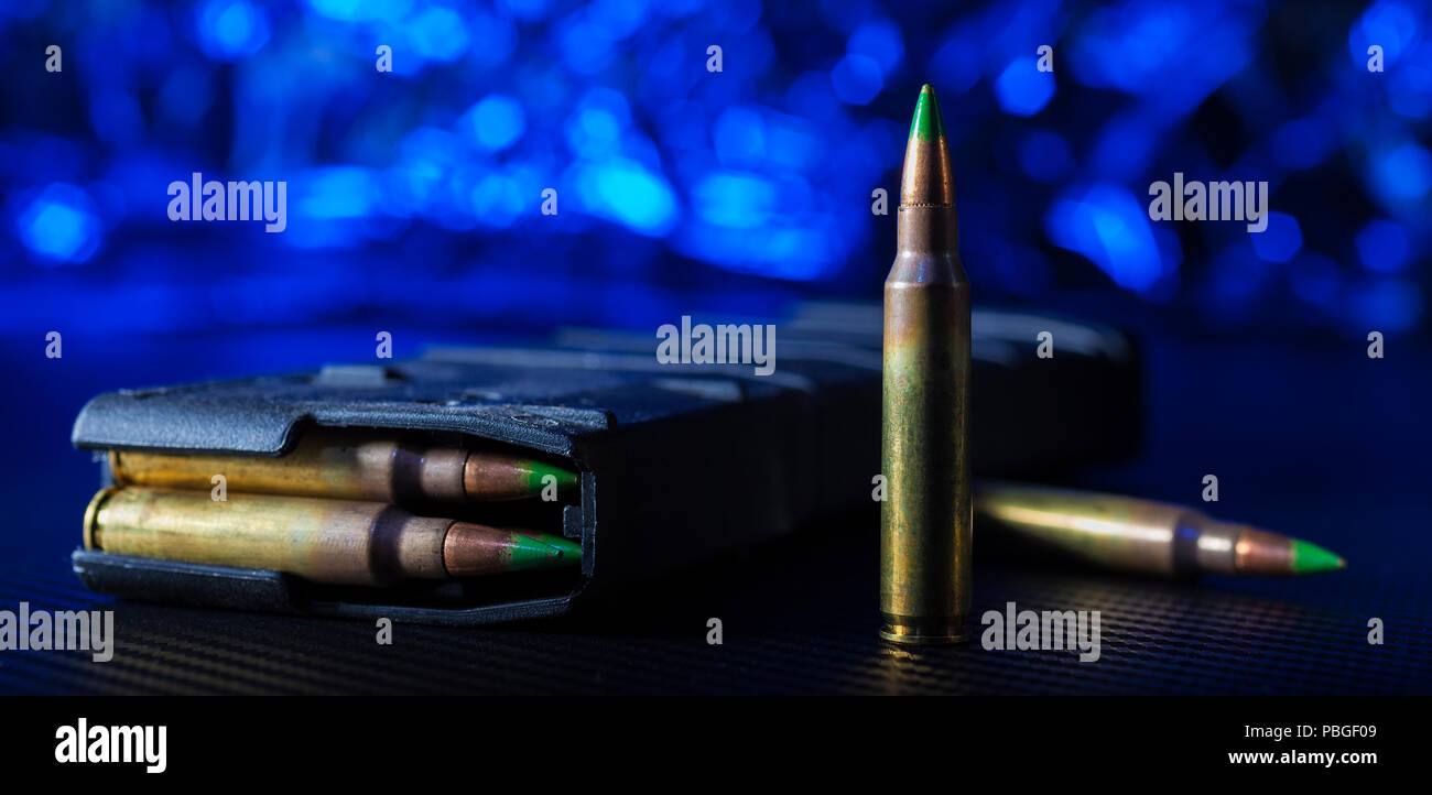 Cartridges and polymer magazine for an AR-15 with blue behind Stock ...