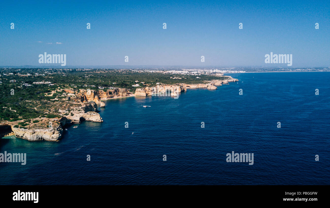 Aerial view of Algarve coast. Beautiful natural beaches with cliff and ...