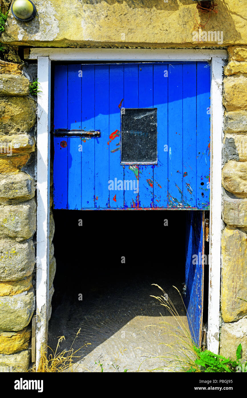 Bi fold blue horses stable door Stock Photo - Alamy