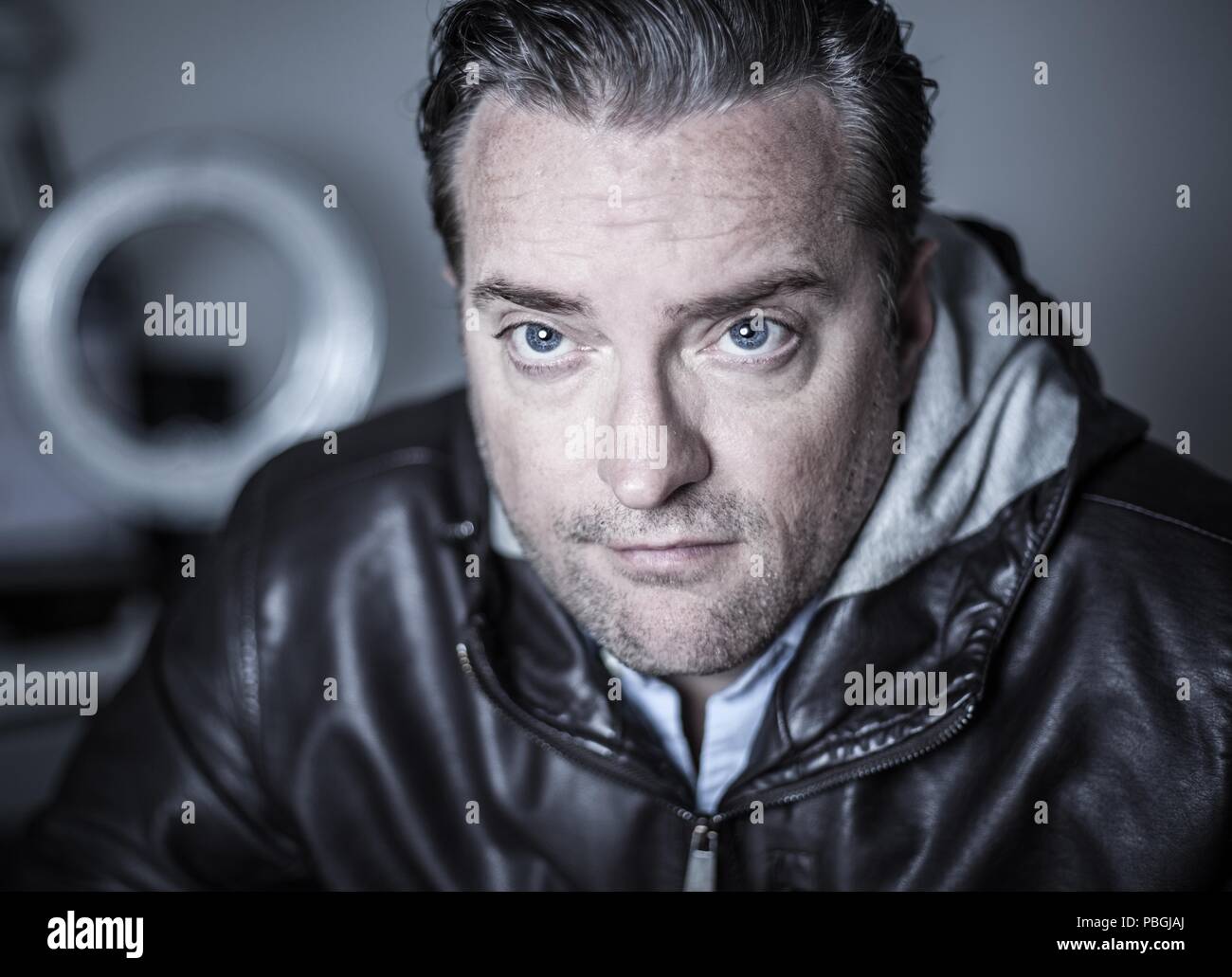 portrait of a handsome man in a leather jacket Stock Photo - Alamy