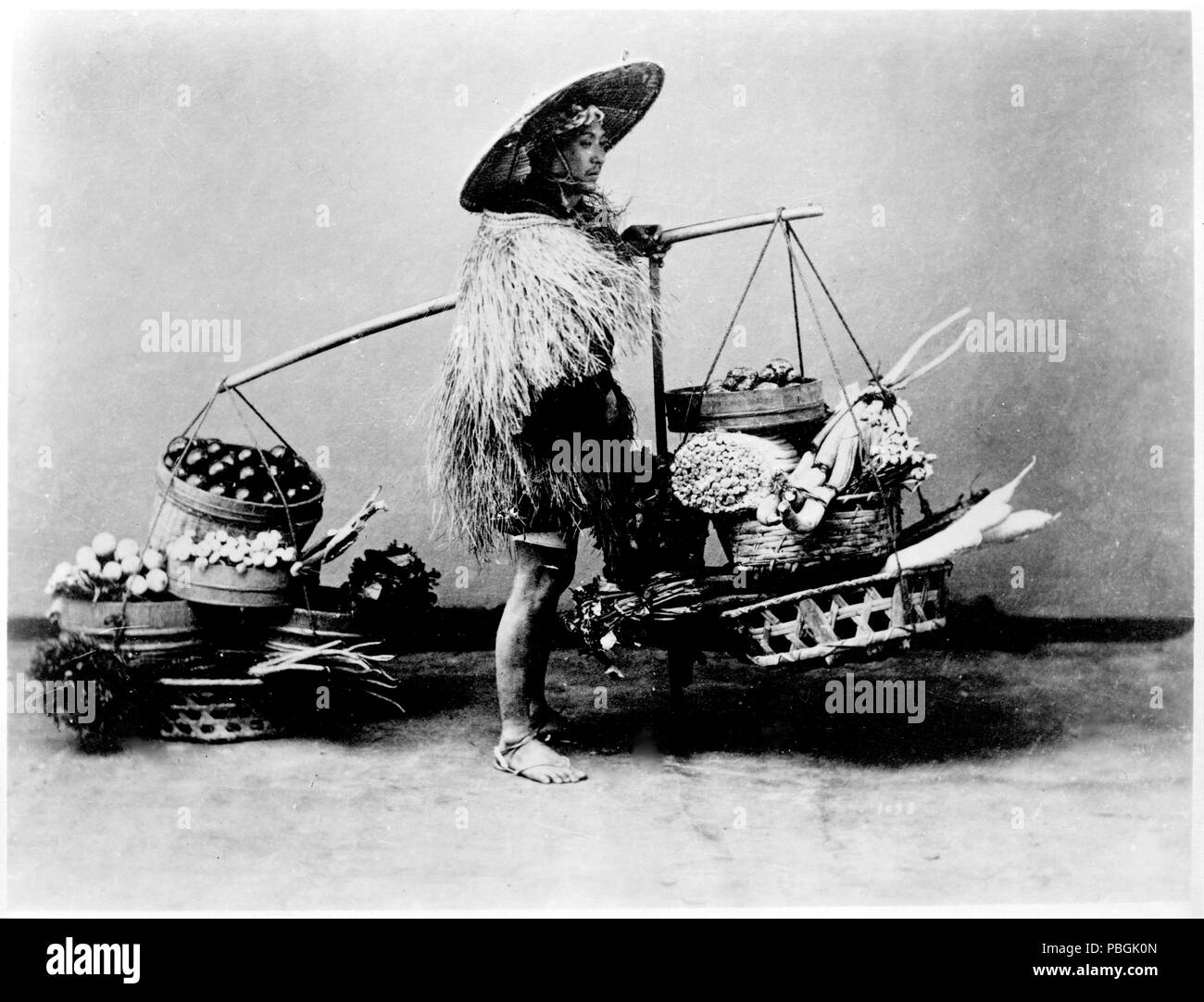 Shoulder pole laden hi-res stock photography and images - Alamy