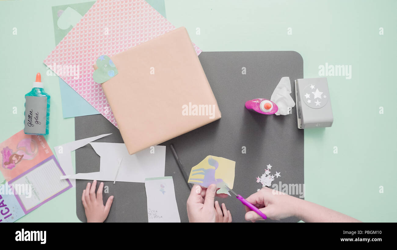 Decorating present kids birthday craft hi-res stock photography and ...