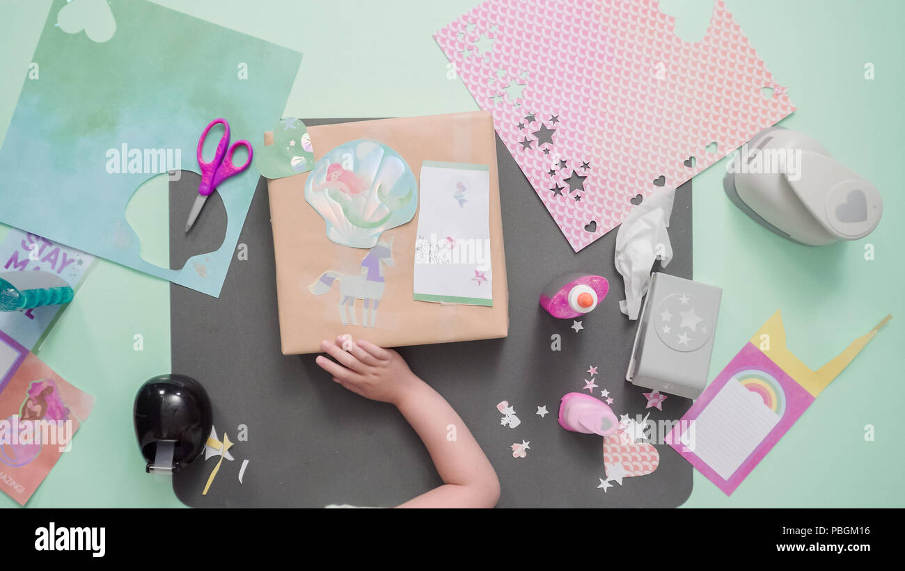 Decorating present kids birthday craft hi-res stock photography and ...
