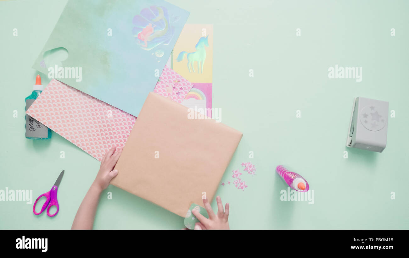 Decorating present kids birthday craft hi-res stock photography and ...