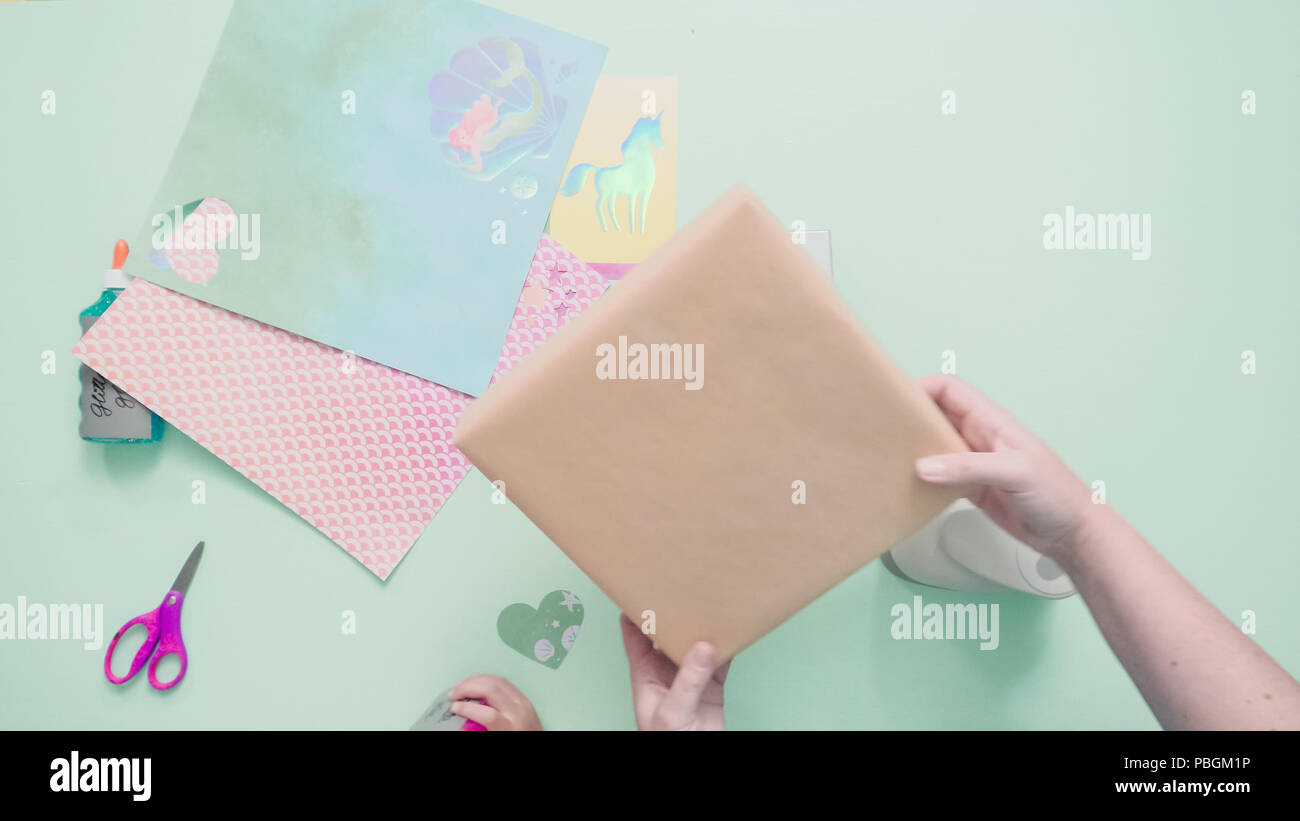 Decorating present kids birthday craft hi-res stock photography and ...