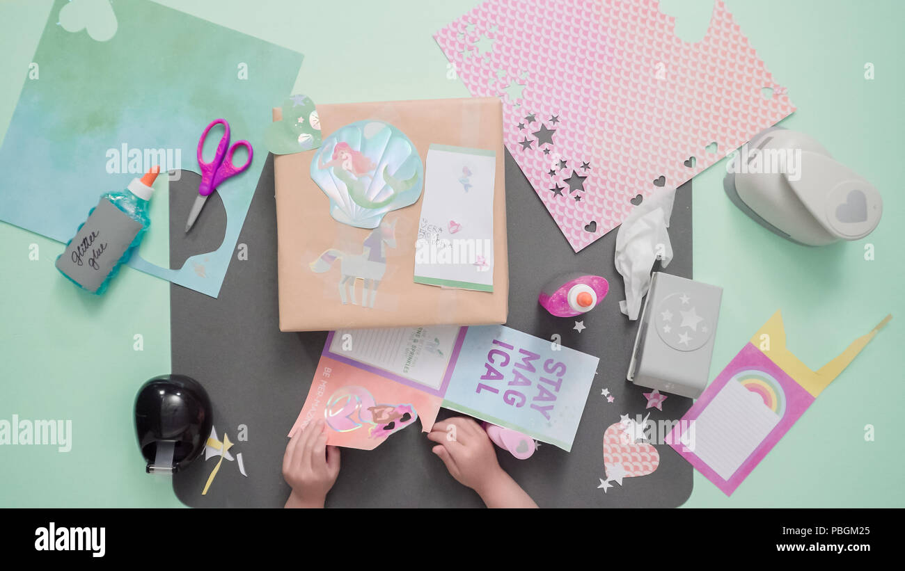 Decorating present kids birthday craft hi-res stock photography and ...