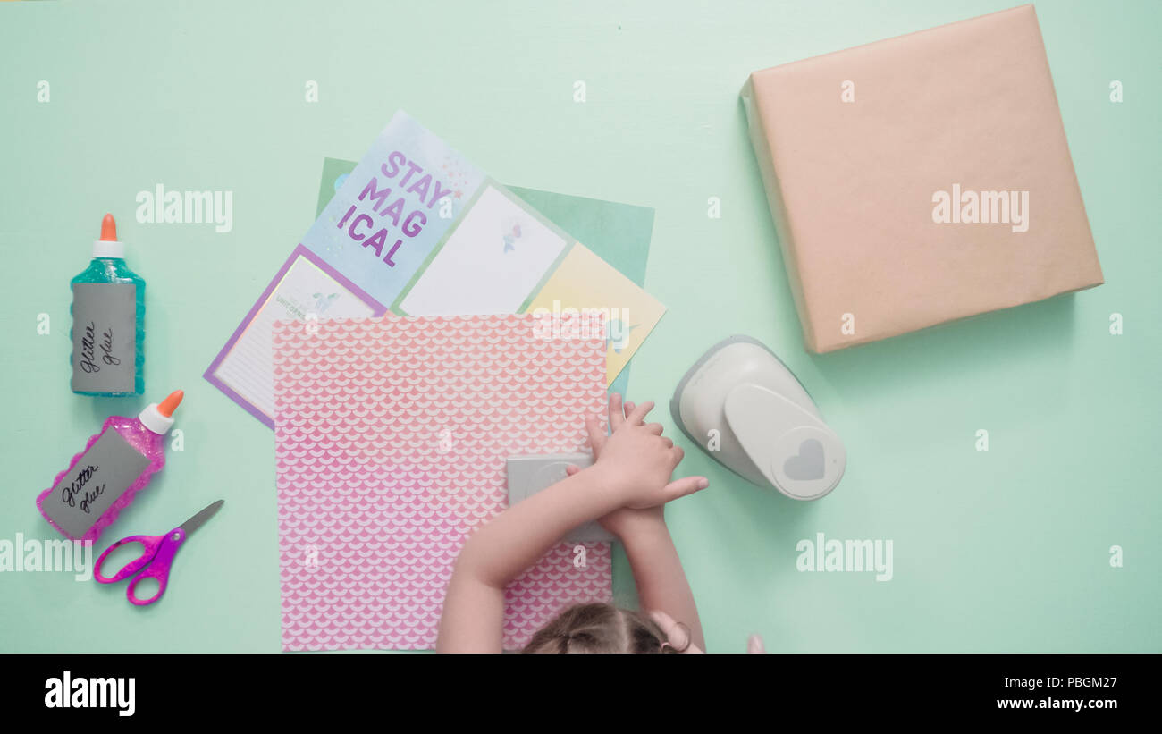 Decorating present kids birthday craft hi-res stock photography and ...