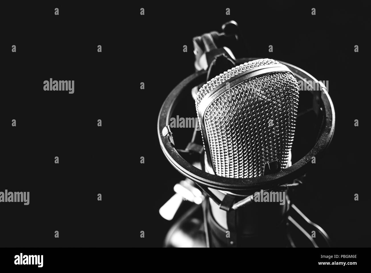 professional Studio condenser microphone on black background Stock ...