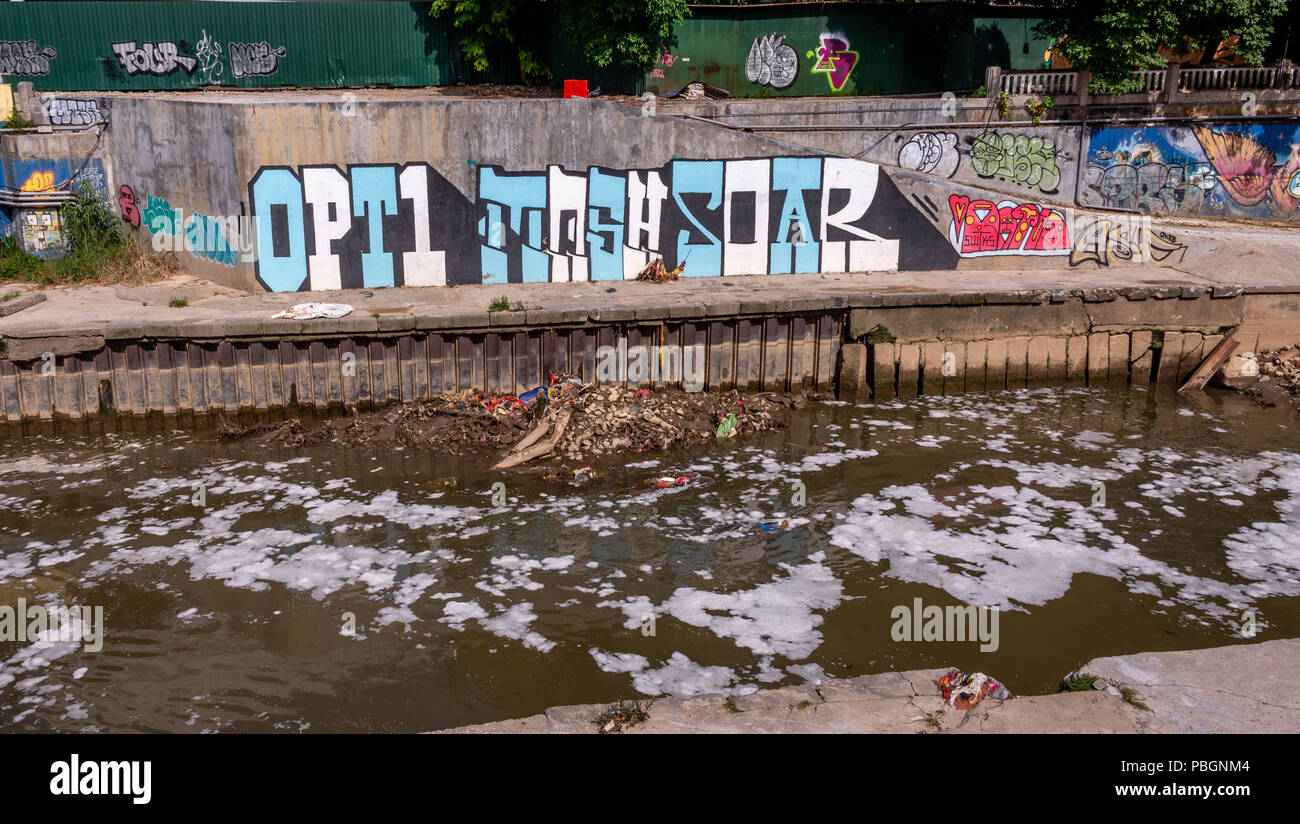 Garbage, pollution and graffiti along the Gombak River in downtown ...
