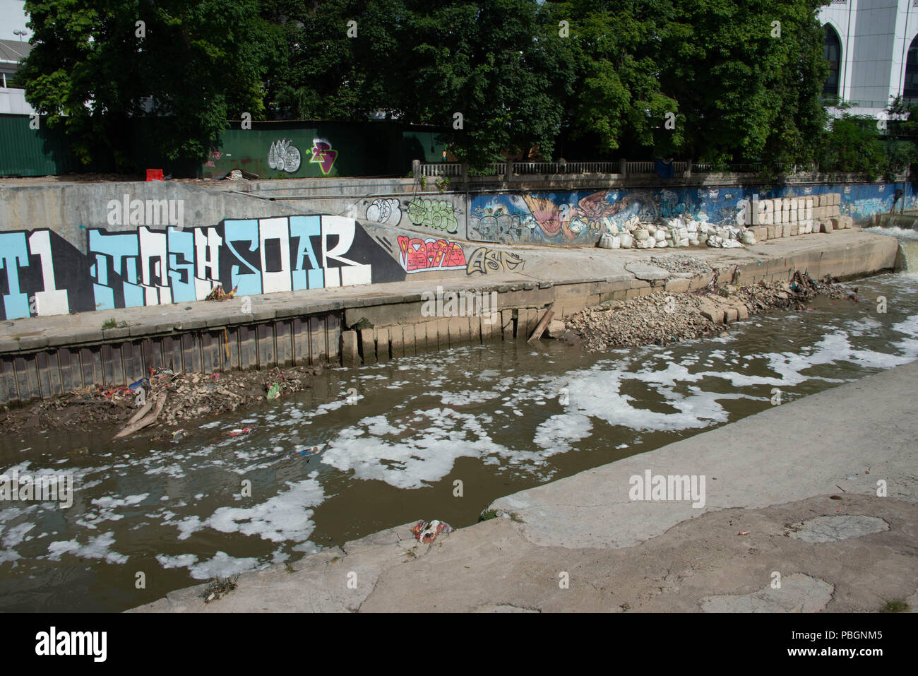 Garbage, pollution and graffiti along the Gombak River in downtown ...