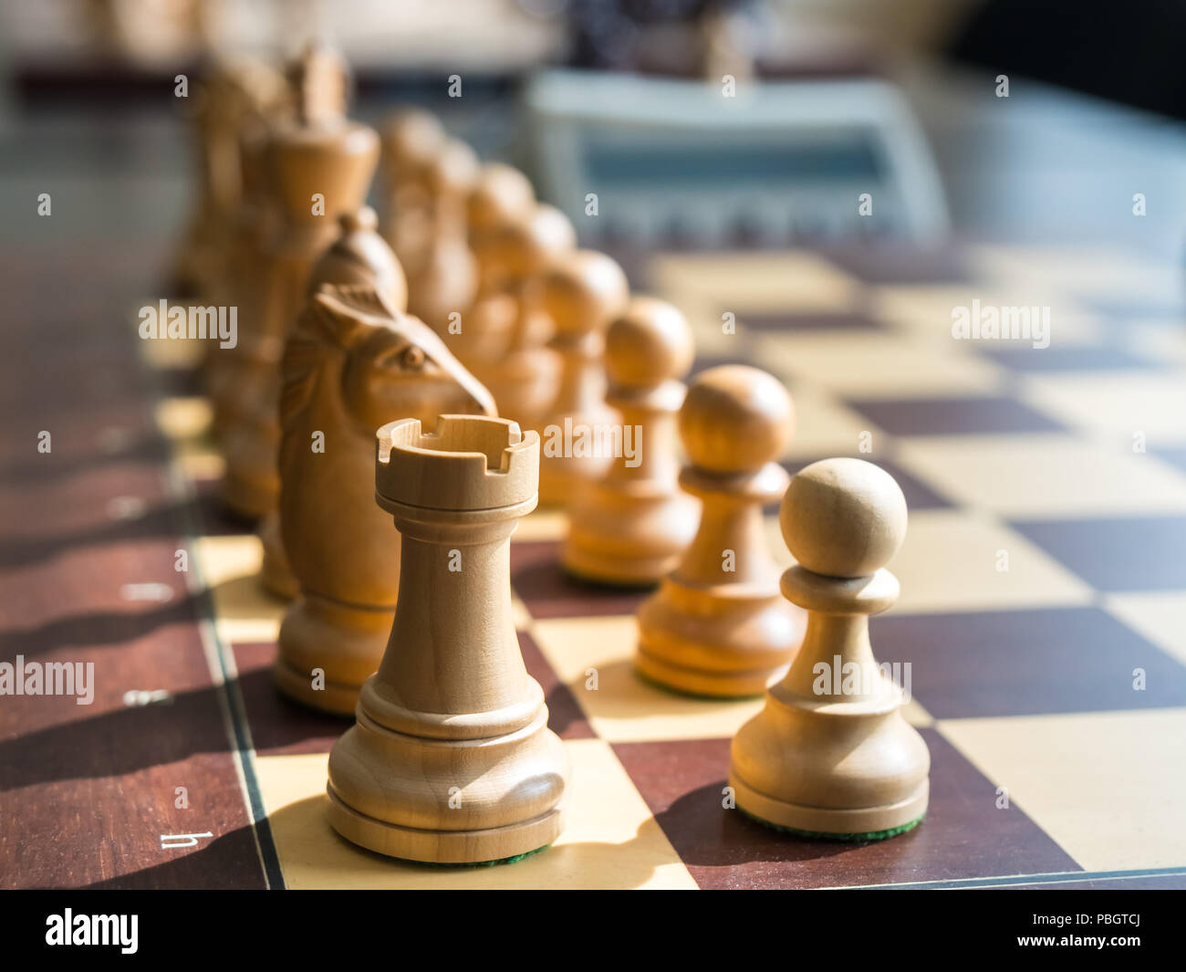 Set of chess figures on the playing board Stock Photo - Alamy