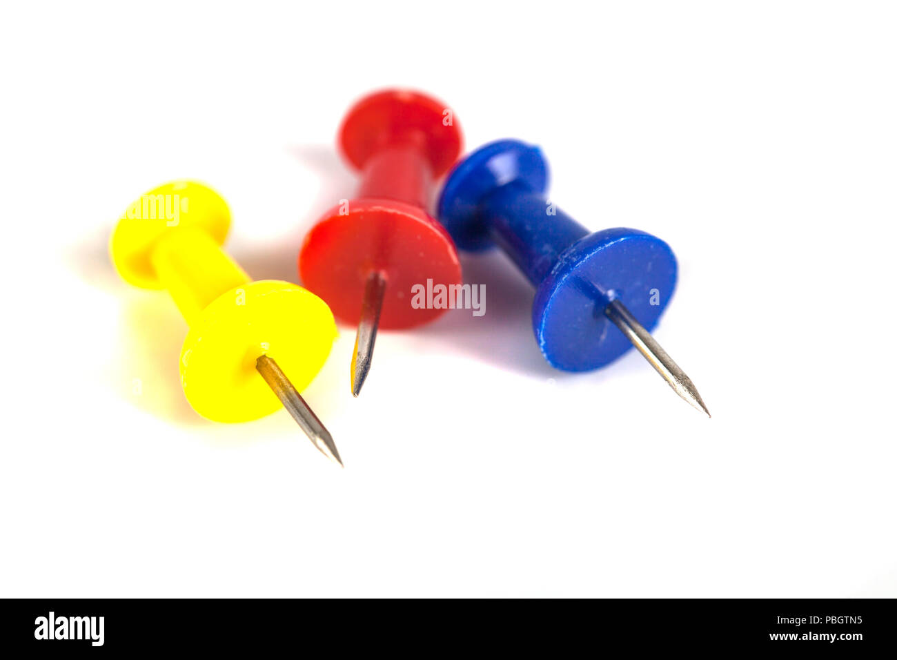Mark pin pile on the white background in office, tacks Stock Photo - Alamy