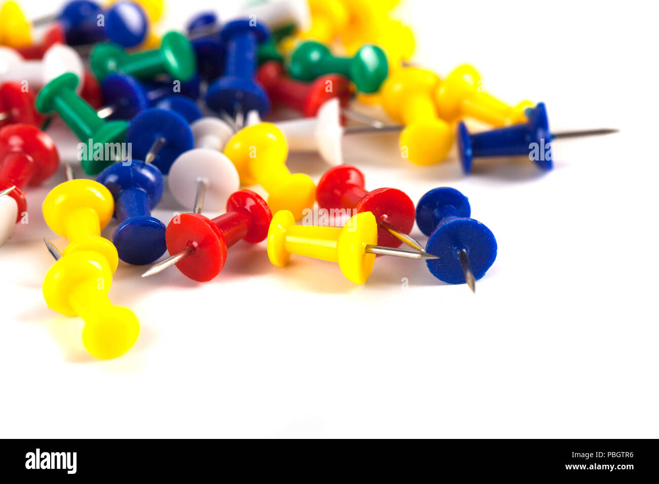Mark pin pile on the white background in office, tacks Stock Photo - Alamy
