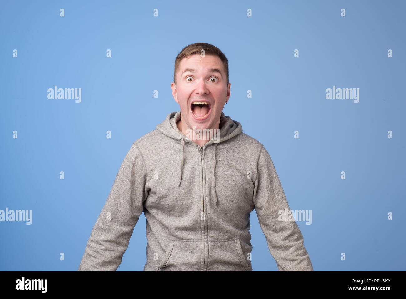 Happy shocked face hi-res stock photography and images - Alamy