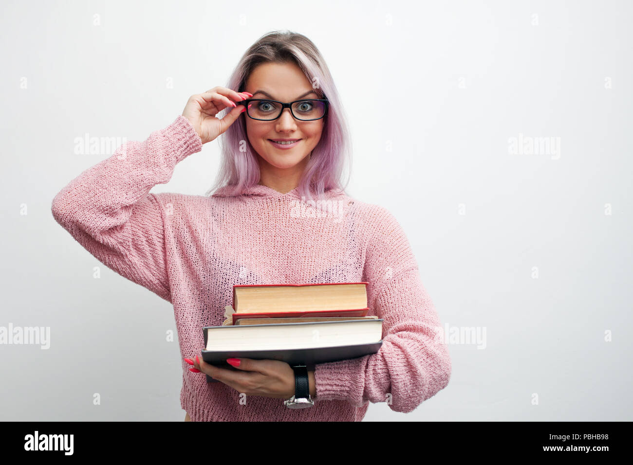 Student. Young woman with books. Nice girl is ready to learn, get ...