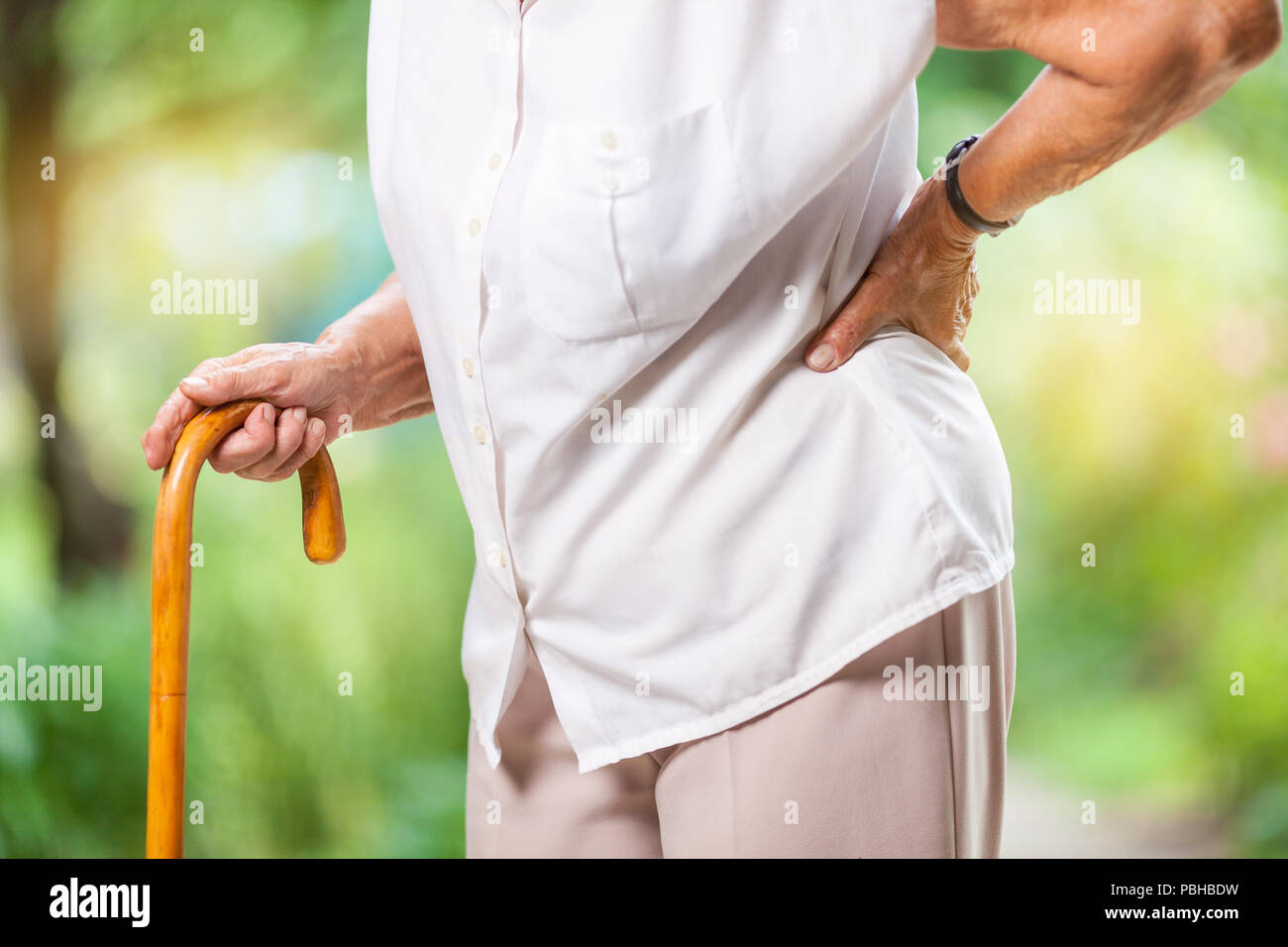 Lower back pain elderly woman hi-res stock photography and images - Alamy