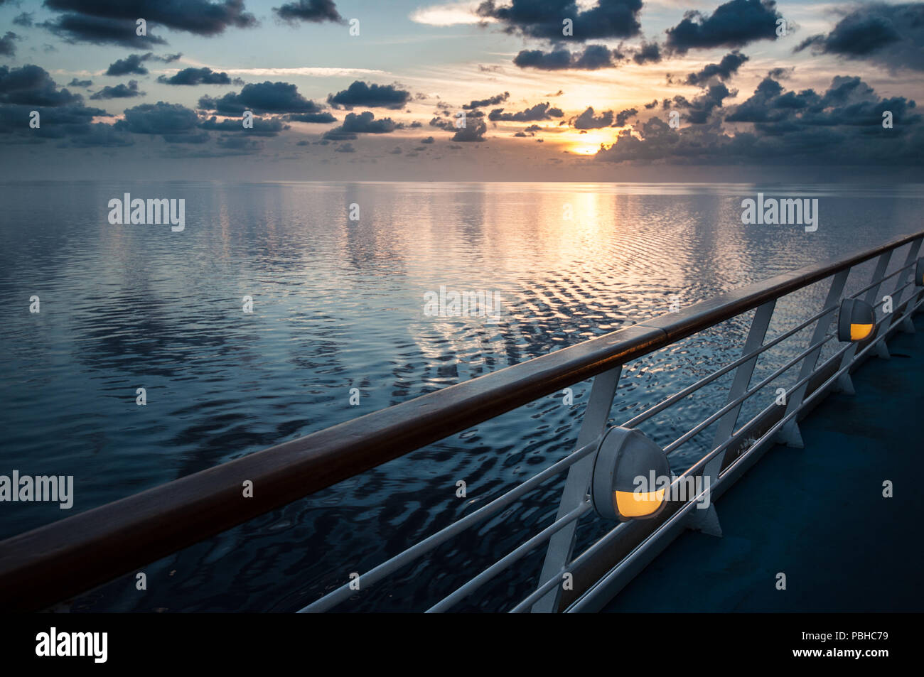 Sunset view during tourist cruise on a ship Stock Photo - Alamy