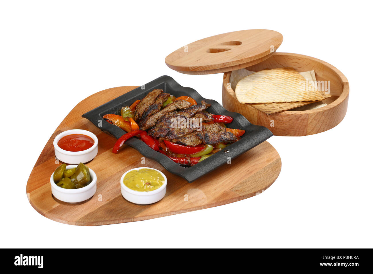 Steak in grill pan Cut Out Stock Images & Pictures - Alamy
