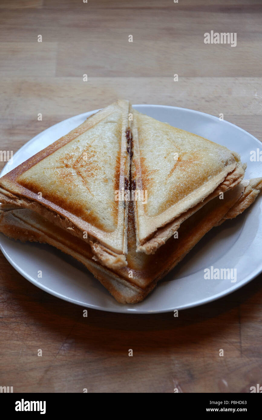 Hot toasted Triangle sandwich Stock Photo - Alamy