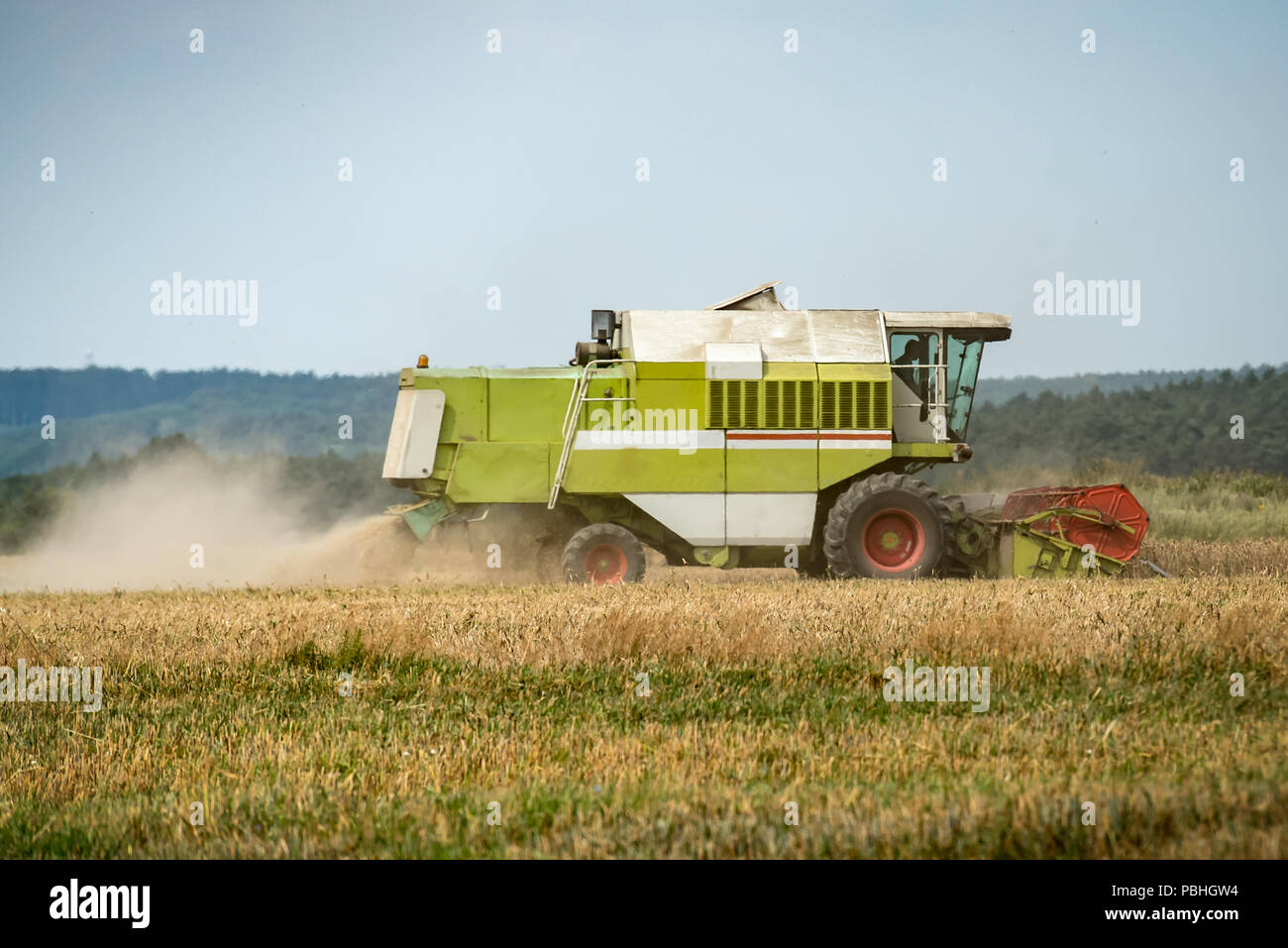 Straw grain harvesting combine hi-res stock photography and images - Alamy