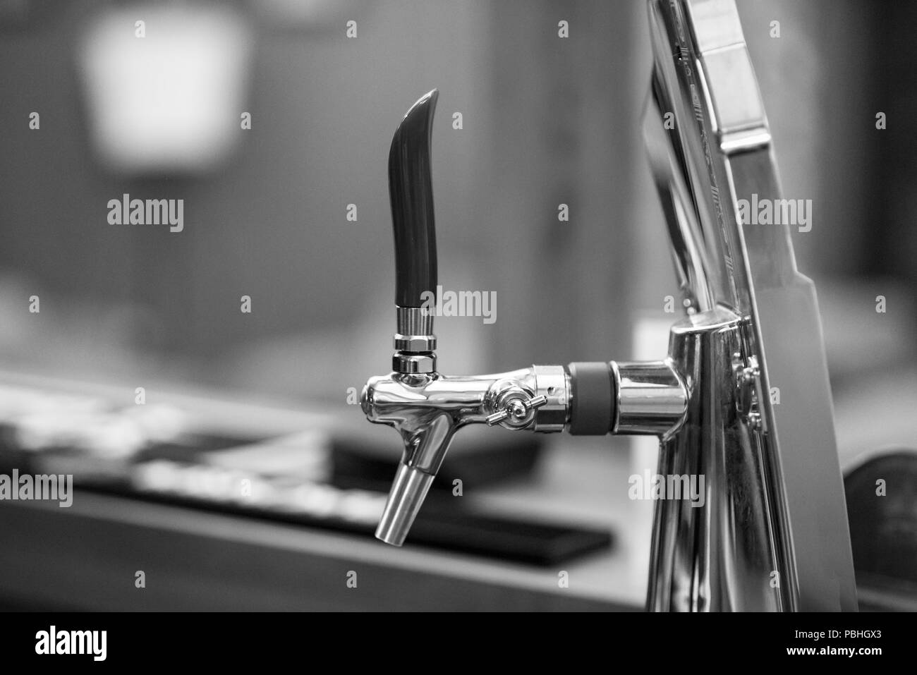 a tap for beer closeup in black and white Stock Photo - Alamy