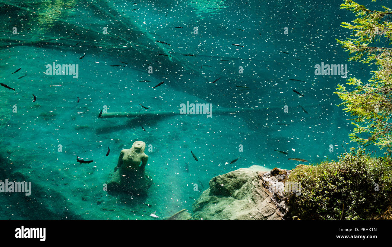 Raphael Fuchs Statue dipped in the clear water of the Blue Lake in the ...
