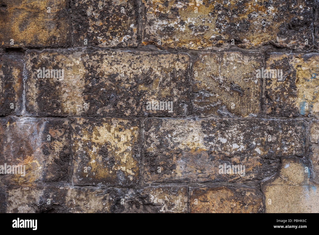 Stone wall background Wall made of cavern rock Stock Photo - Alamy