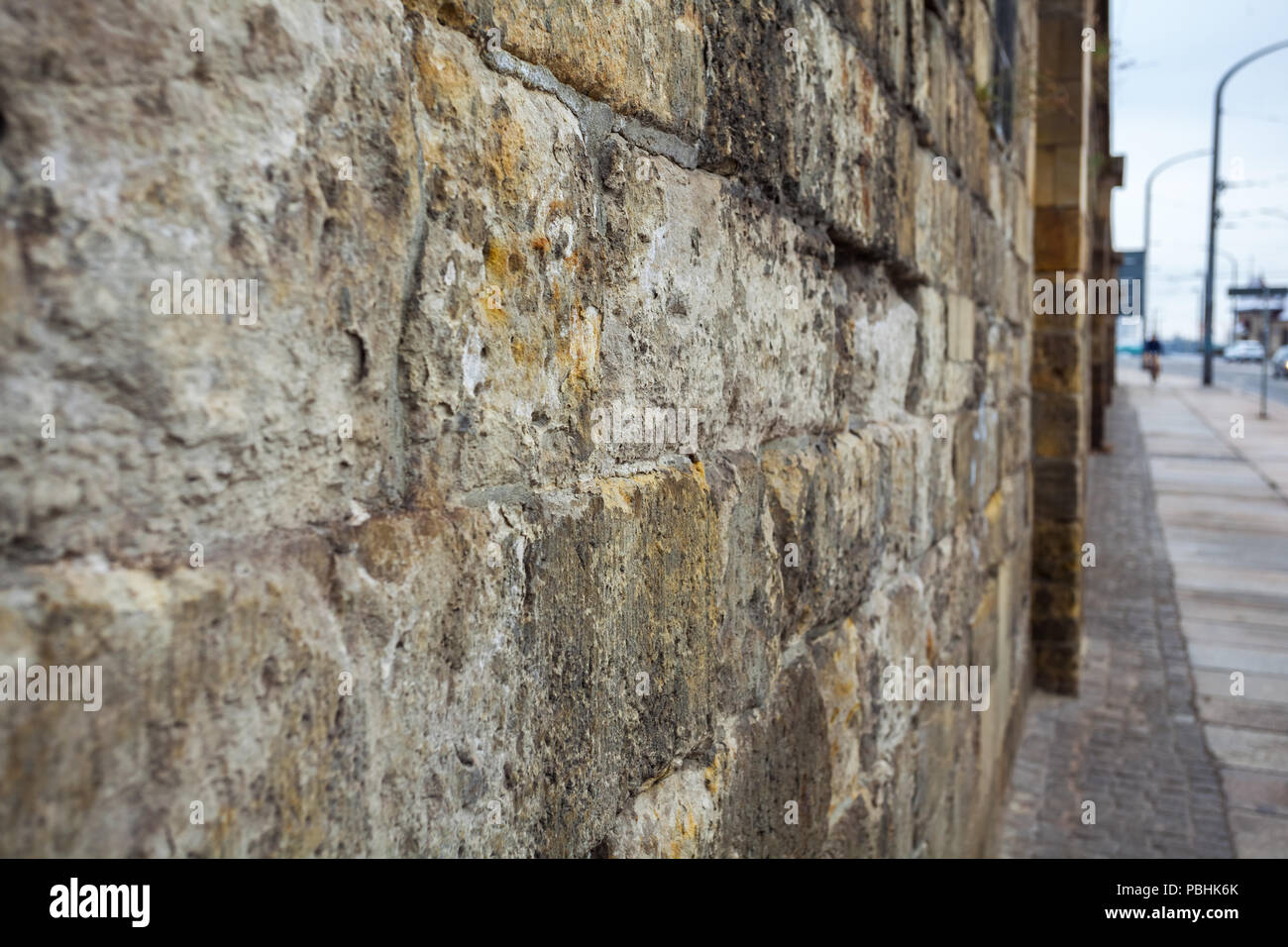 Stone wall background Wall made of cavern rock Stock Photo - Alamy